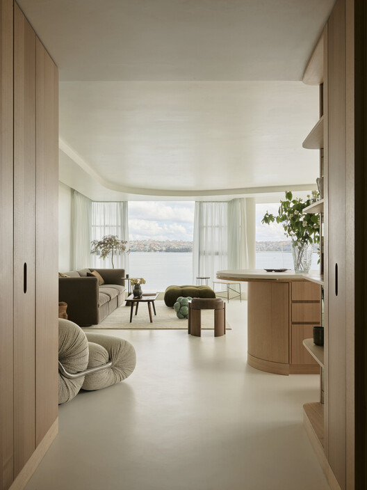 layers of soft neutrals and panoramic glass for harbour-facing darling ...