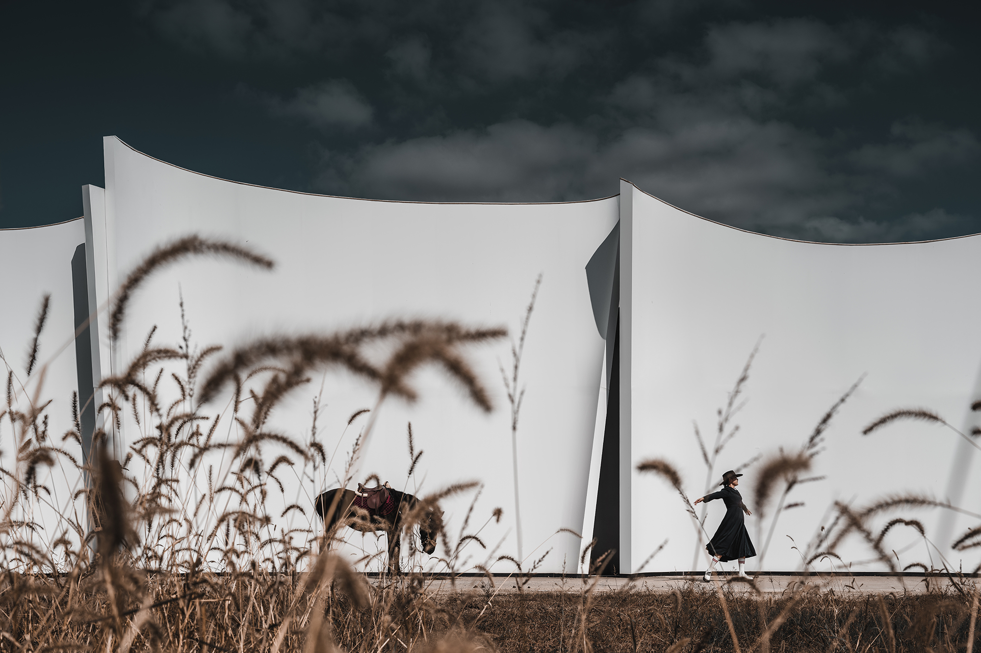 ideorealmdesign builds white wedding chapel with petal-like curves in ...