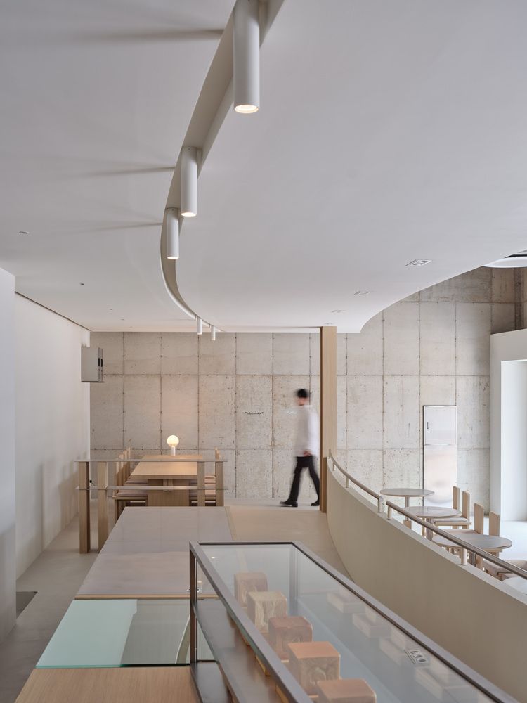 news: natural and bespoke materials generate timeless minimalism at ...