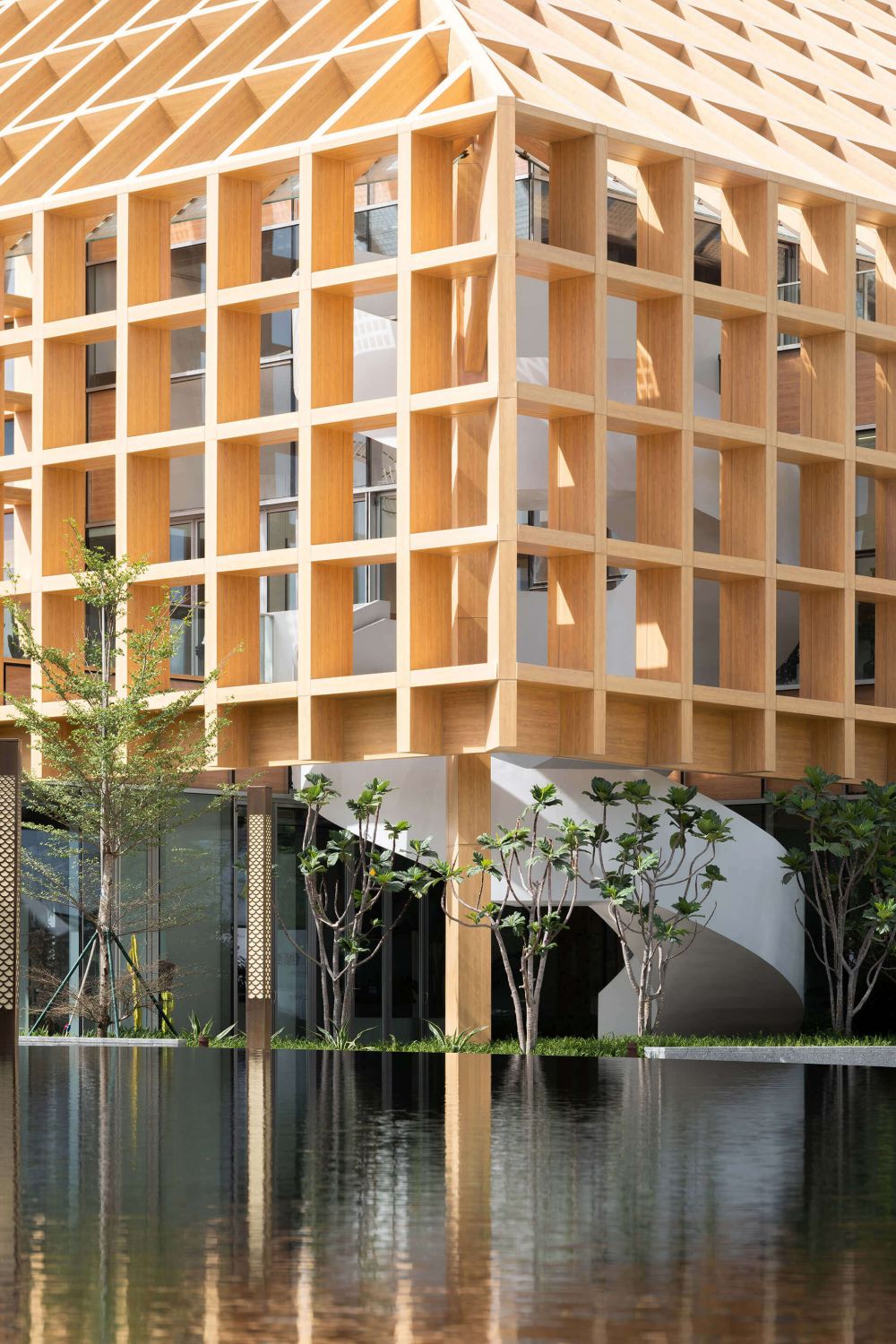 the stunning wooden grid farmlab in sanya is inspired by straw-roof ...