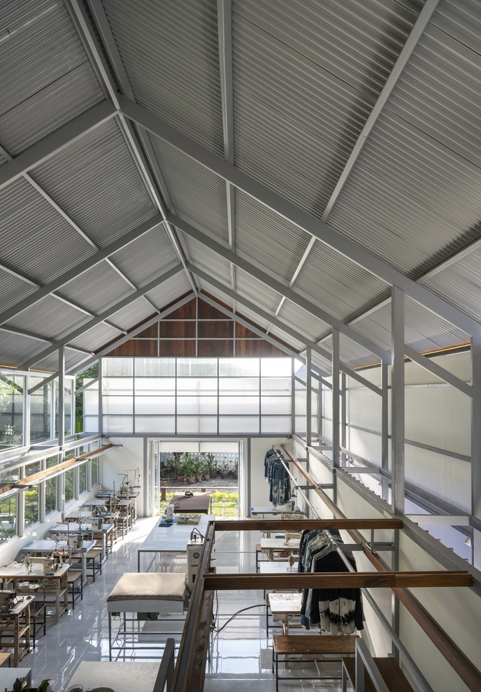 sher maker designed a barn-inspired workshop for thai's street fashion ...