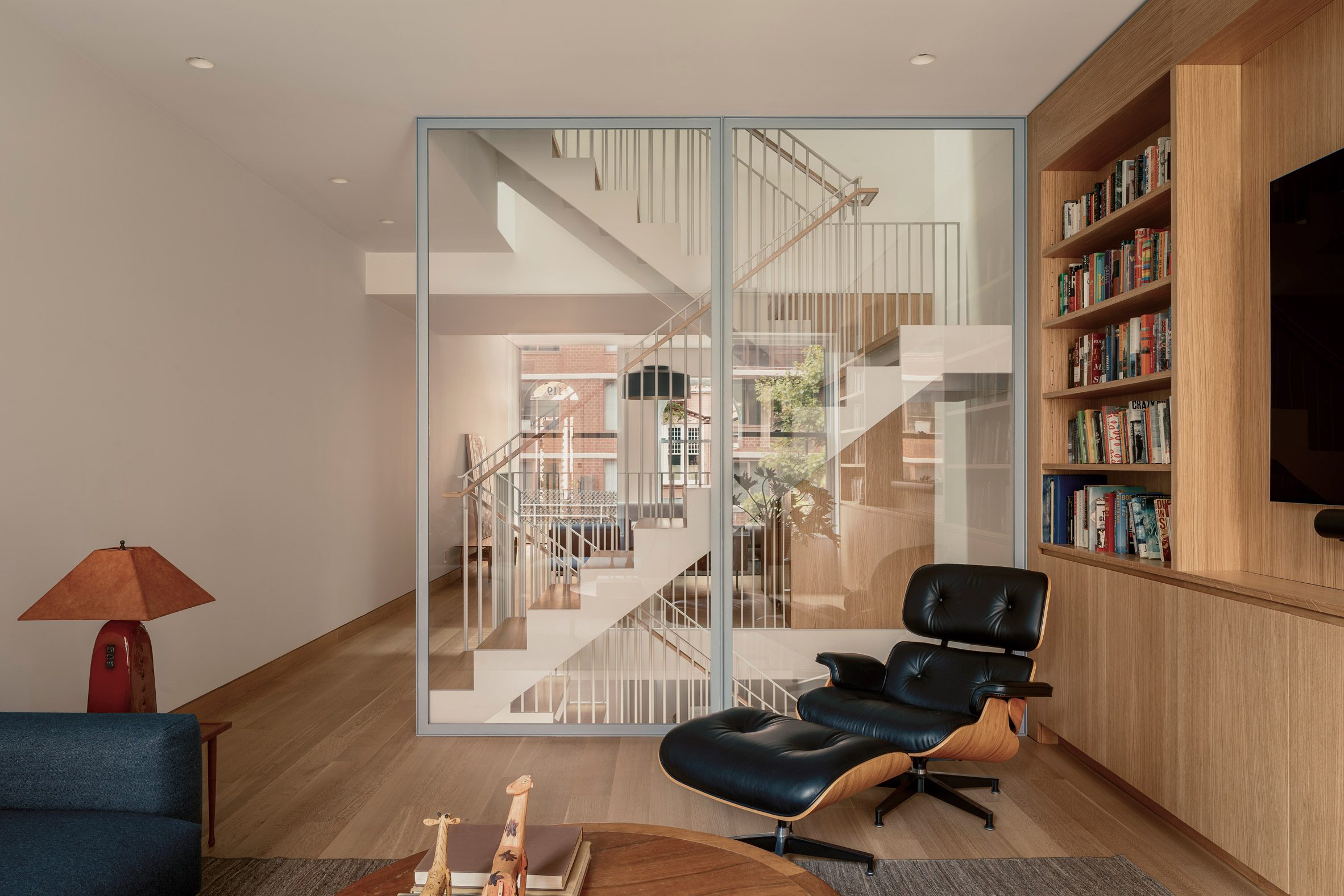 light and air architecture reimagines new york townhouse with vertical void | the design story