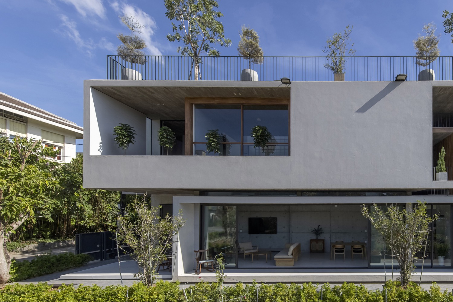 pvt house combines raw concrete and nature for peaceful contemporary ...