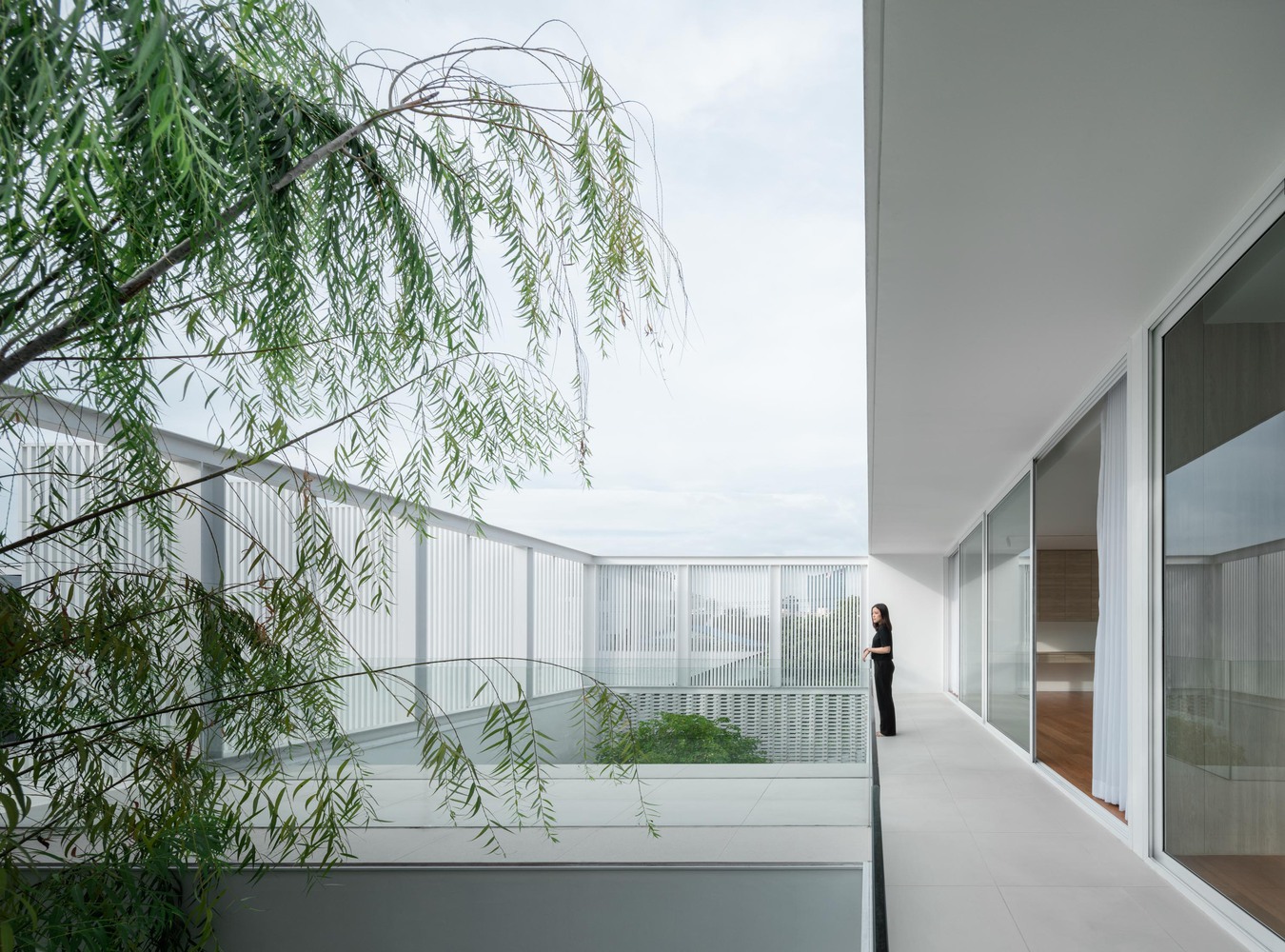 veil house sparks ethereality using translucent screens and courtyards ...