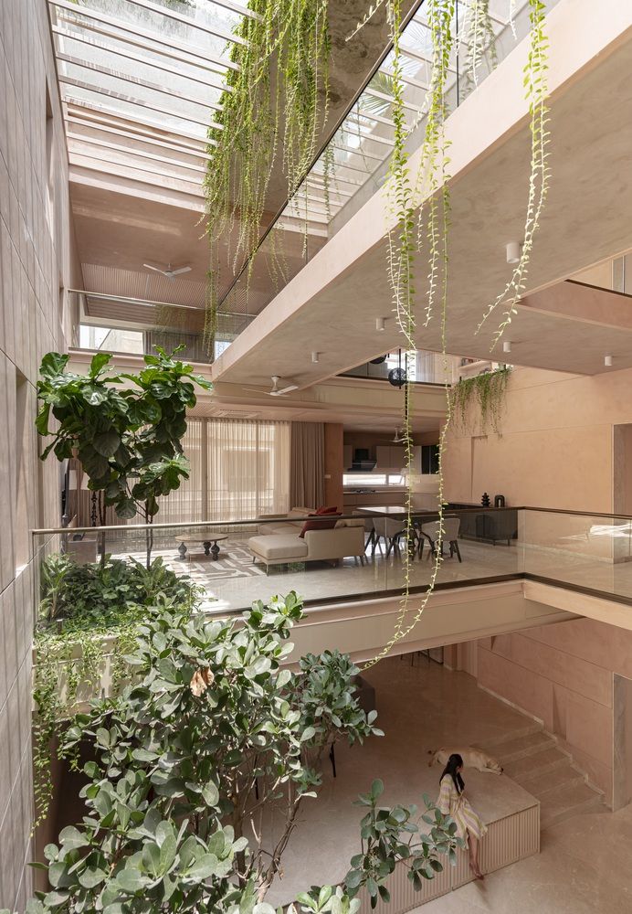 spacefiction studio completes a contemporary organic home with abundant ...