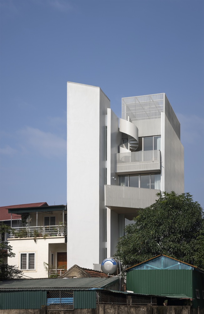 tram house redefines urban living in a white tower haven: project by ho ...