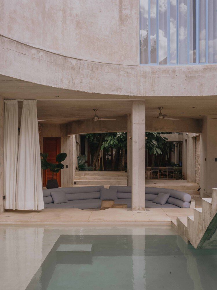 soskil house redefines organic comfort with an open-plan concrete home ...