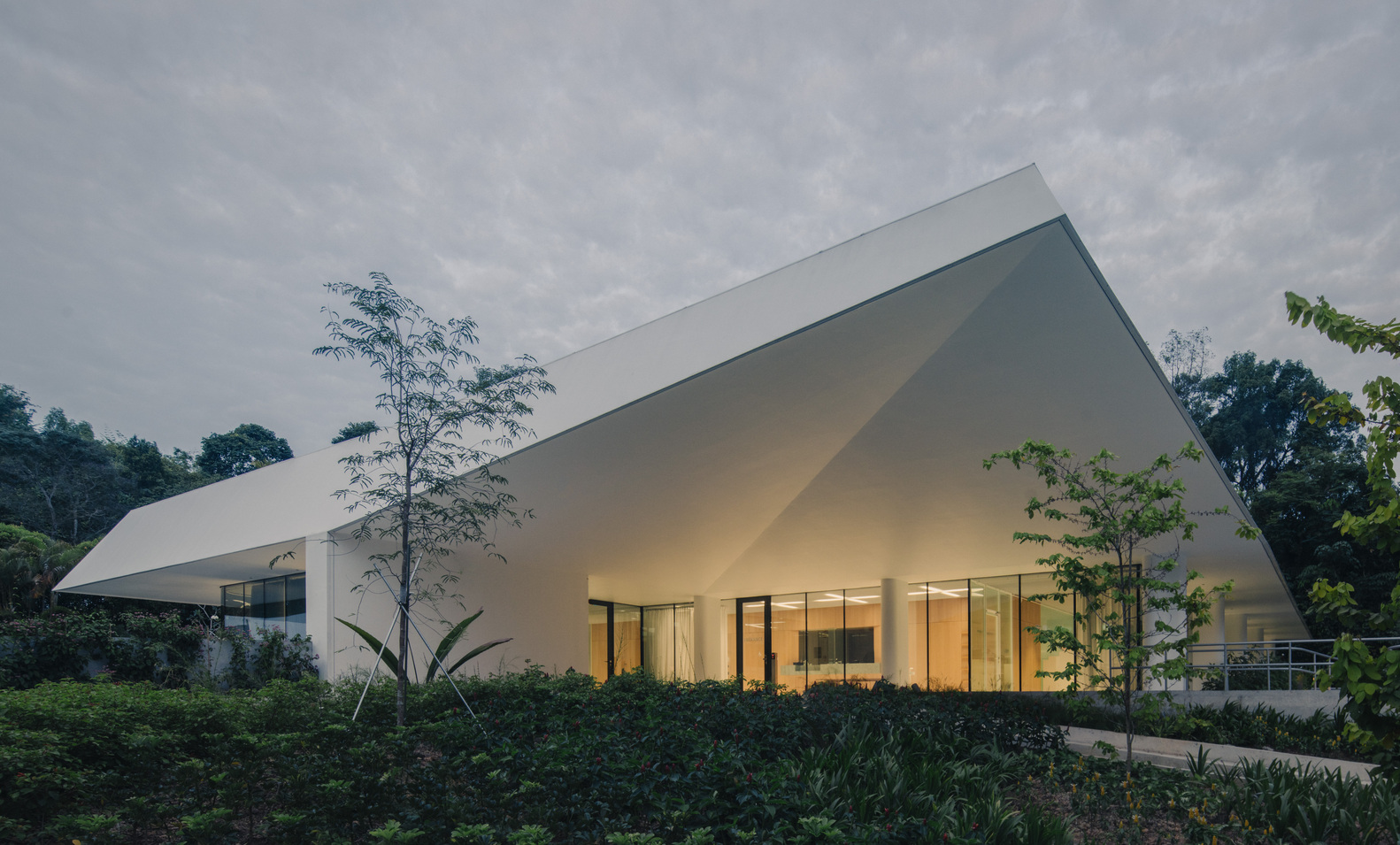 blending nature and minimalism at the swiss embassy in singapore ...