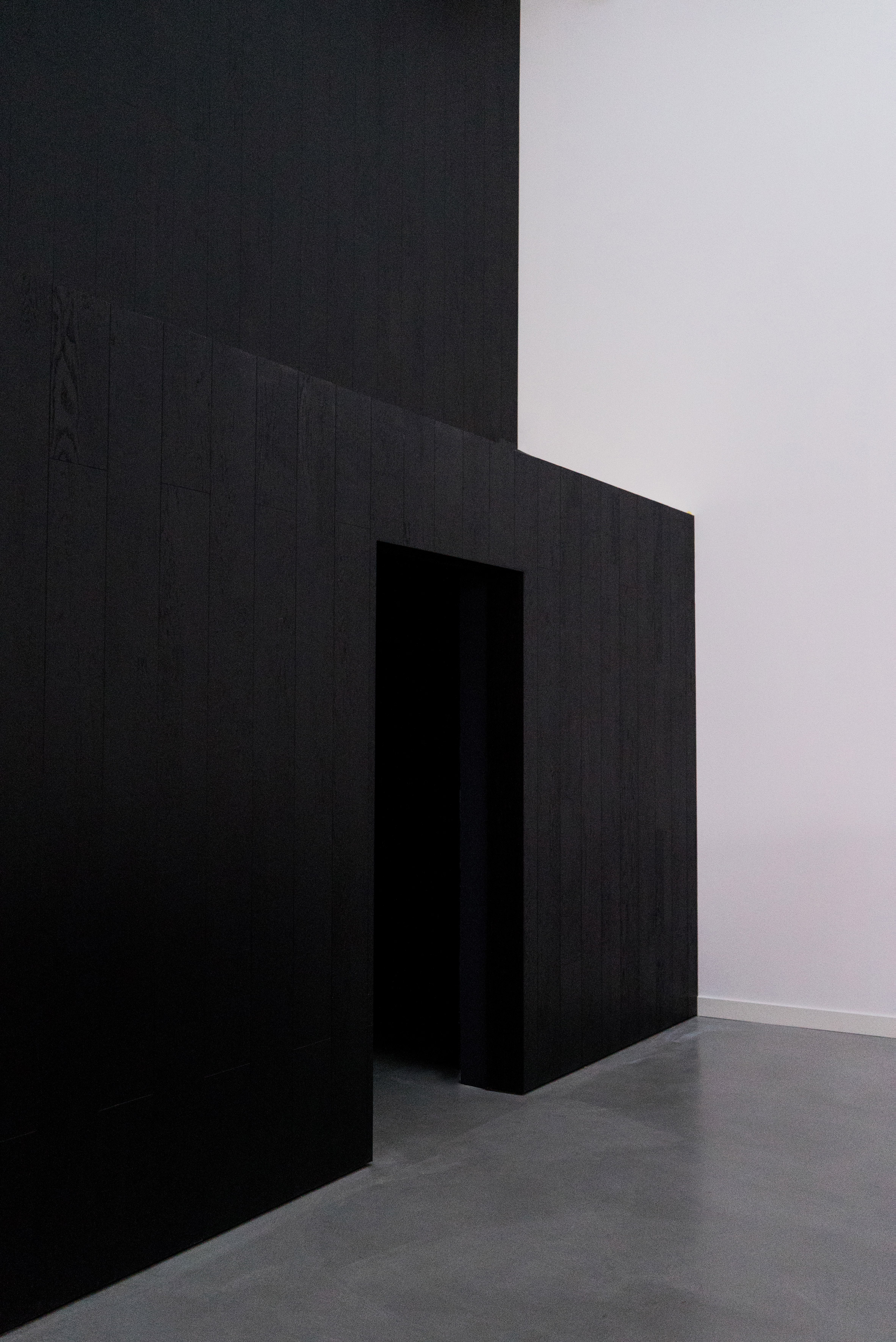 a masculine, black-dominated office design by amos and amos | the ...