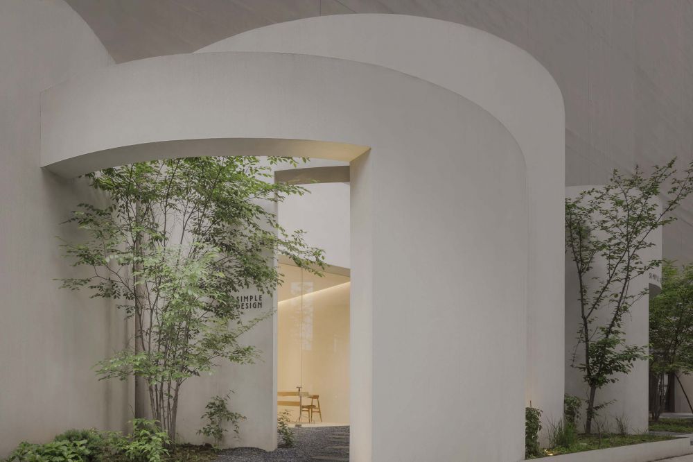 white and curvaceous, simple design archive emerges as a living ...