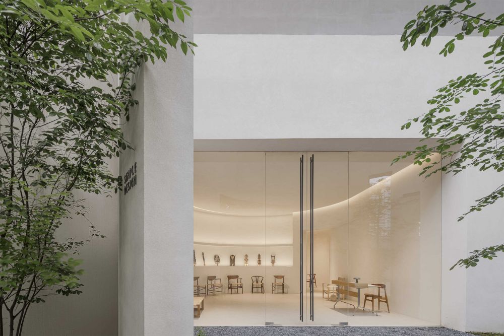 white and curvaceous, simple design archive emerges as a living ...