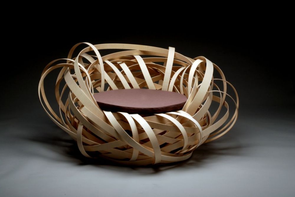 news: 8 sculptural chairs entirely made of wood | the design story