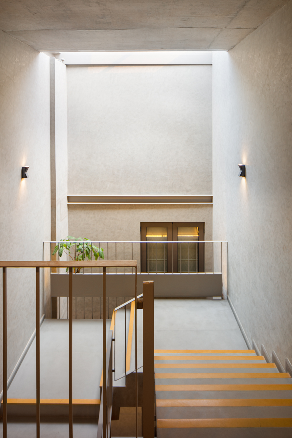 reimagining the archetype of poorly-lit row-houses: stacked house ...