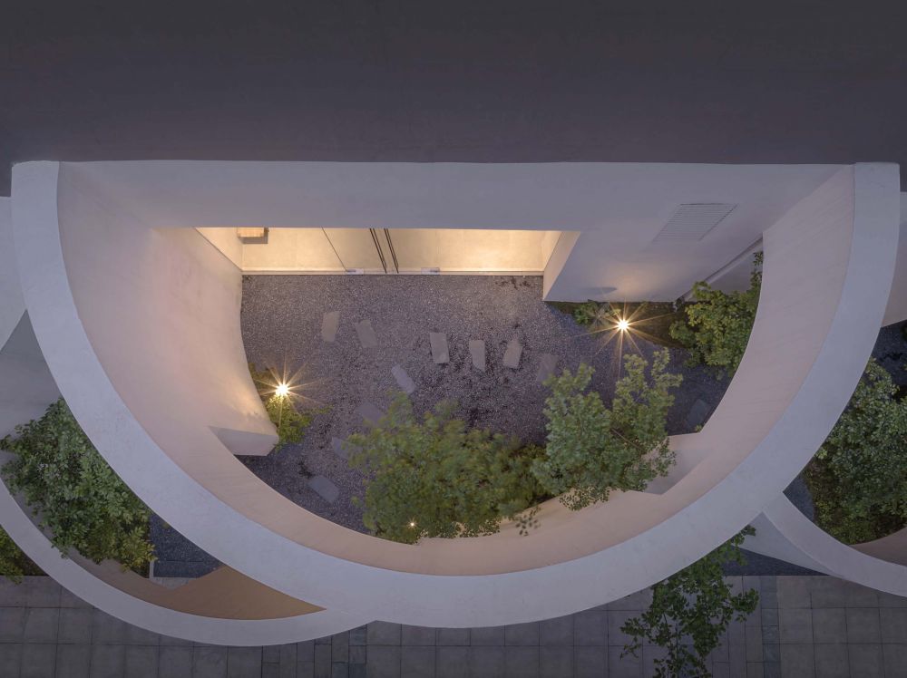 white and curvaceous, simple design archive emerges as a living ...