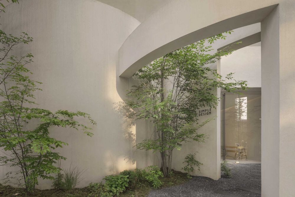 white and curvaceous, simple design archive emerges as a living ...