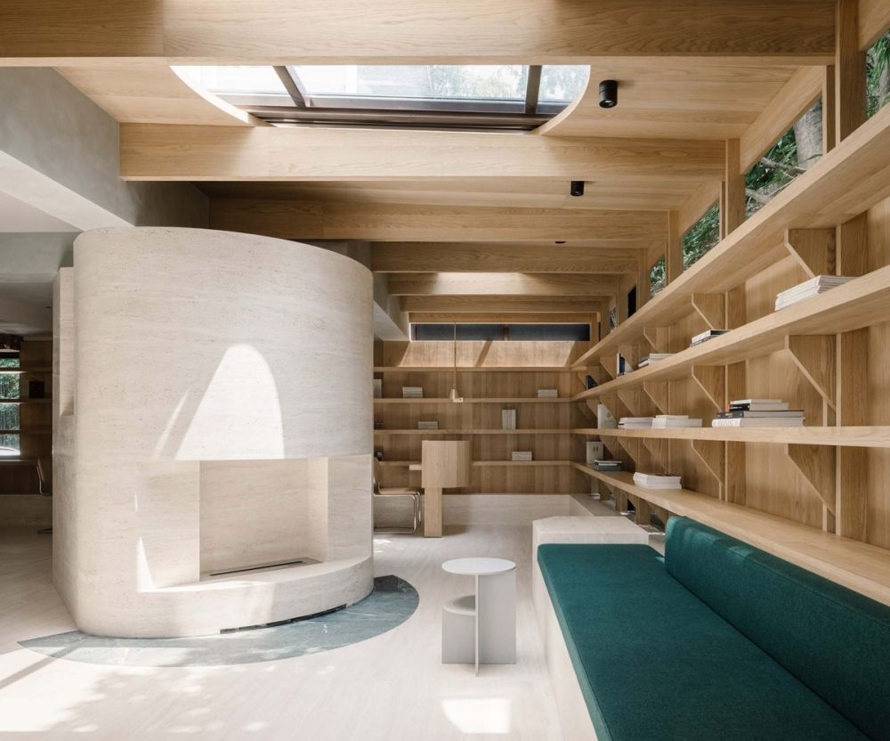 an introverted reading space with wood and beams: project by atelier ...