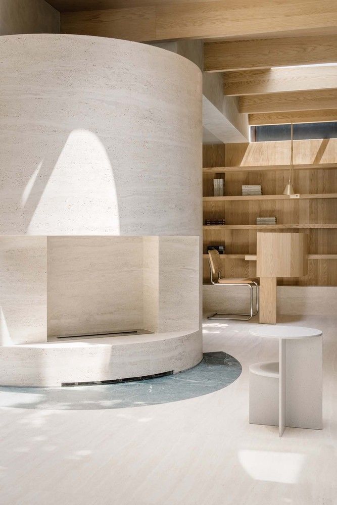 an introverted reading space with wood and beams: project by atelier ...