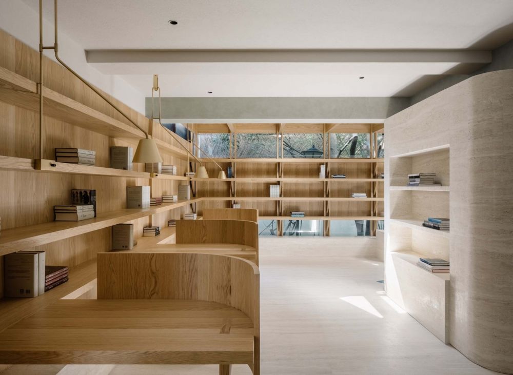 an introverted reading space with wood and beams: project by atelier ...