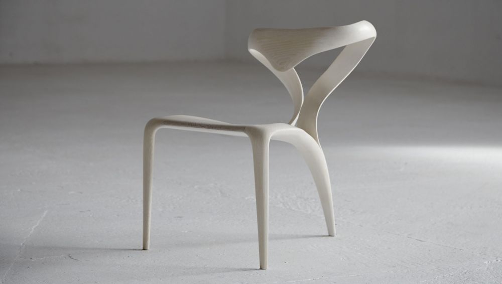 news: 8 sculptural chairs entirely made of wood | the design story