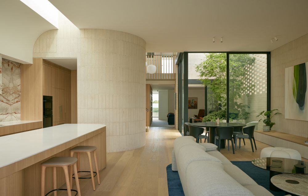 baystreet mixed-use building blends home, studio, and green spaces ...