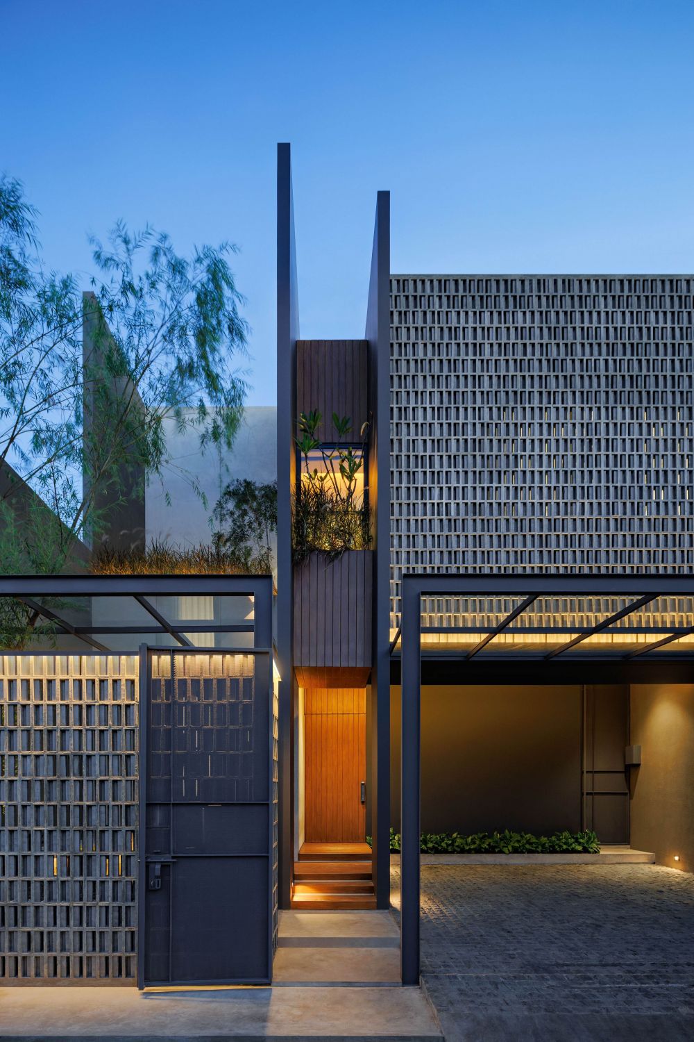 brox house balances introverted living and breathable design: project ...
