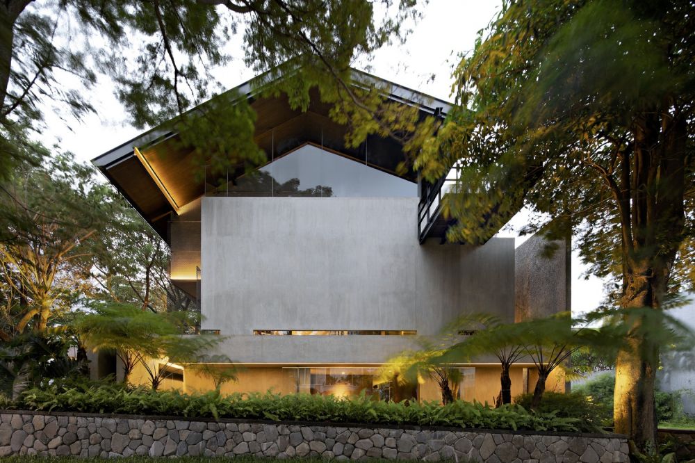 a tropical tranquil retreat with raw and masculine urban undertones ...