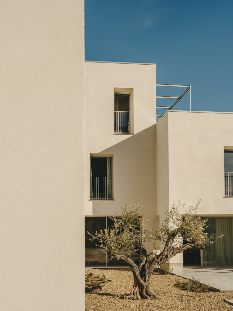marrying sustainable design with mediterranean minimalism: td house ...