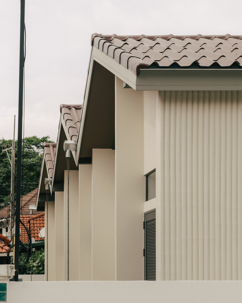 flow house combines nature and earthy materials for a cozy retirement ...