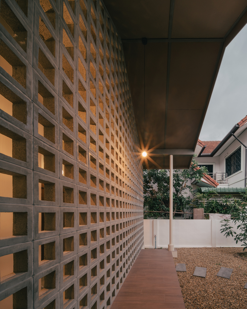 flow house combines nature and earthy materials for a cozy retirement ...