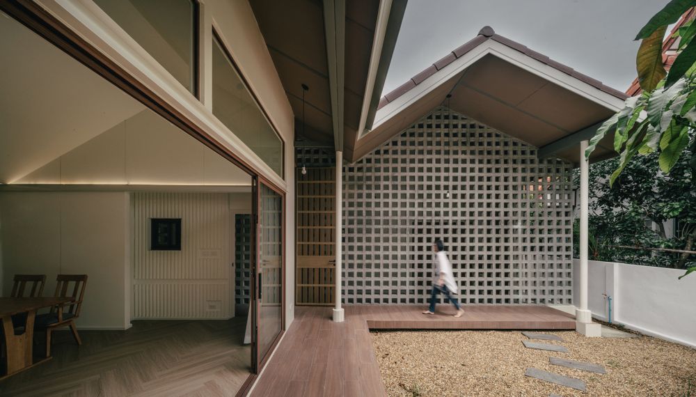 flow house combines nature and earthy materials for a cozy retirement ...