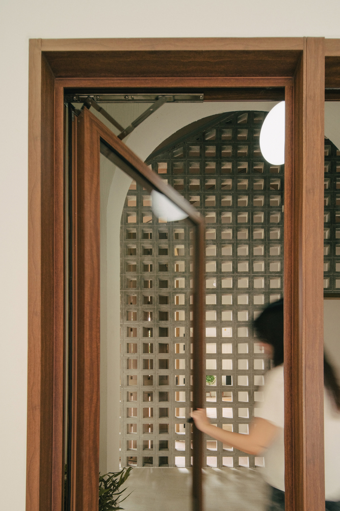 flow house combines nature and earthy materials for a cozy retirement ...