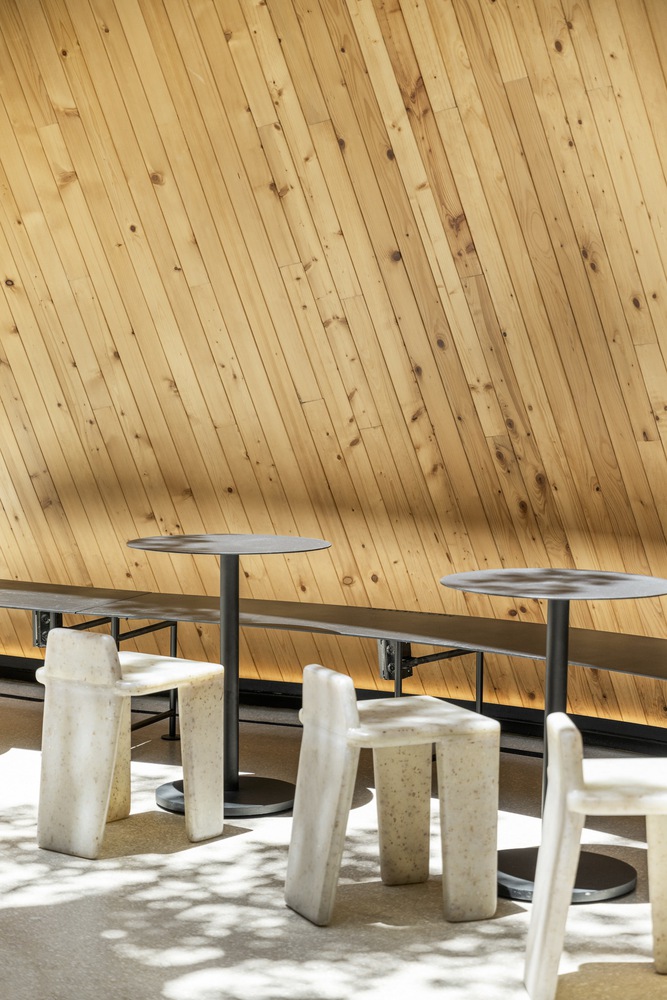 harudot cafe echoes springtime reverie within wood: project by idin ...