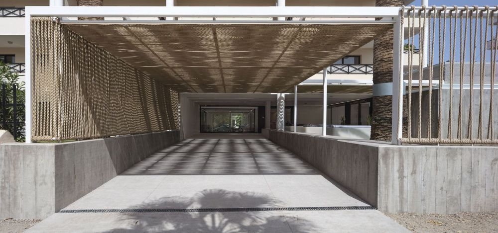 utilizing hand-woven canopy on hotel parque la paz refurbishment ...