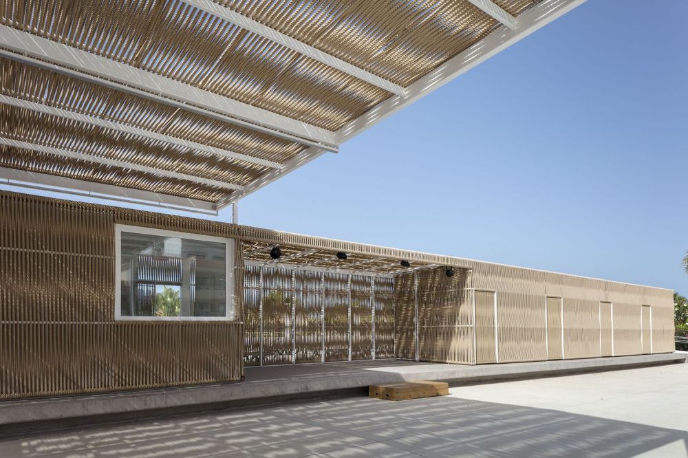 utilizing hand-woven canopy on hotel parque la paz refurbishment ...