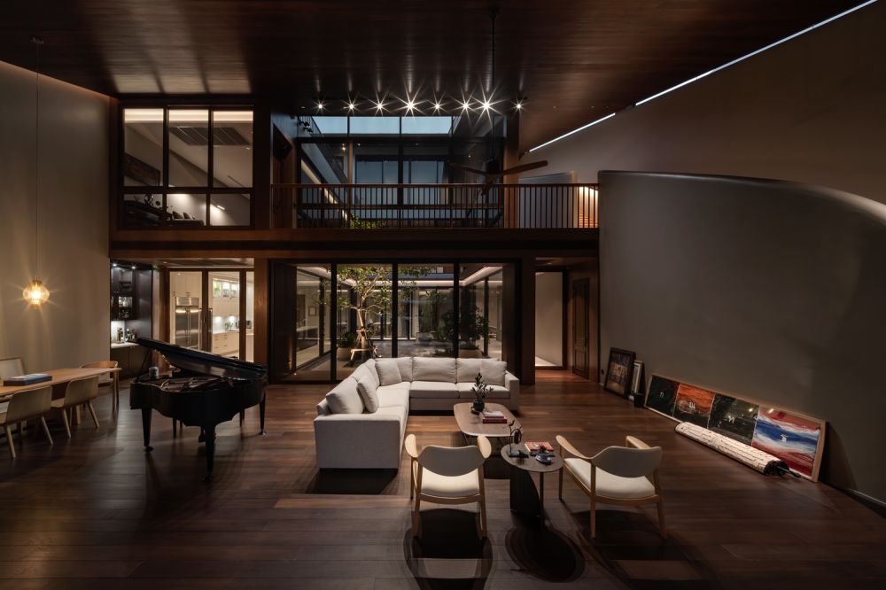 roof house redefines multigenerational living with a courtyard and open ...