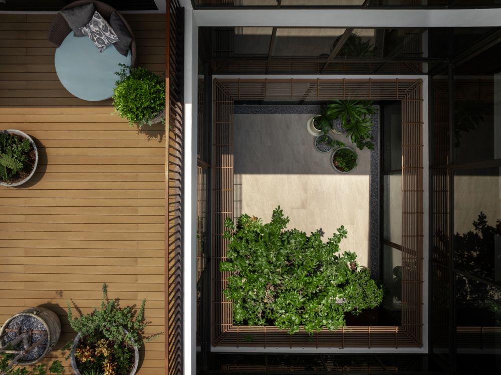 roof house redefines multigenerational living with a courtyard and open ...