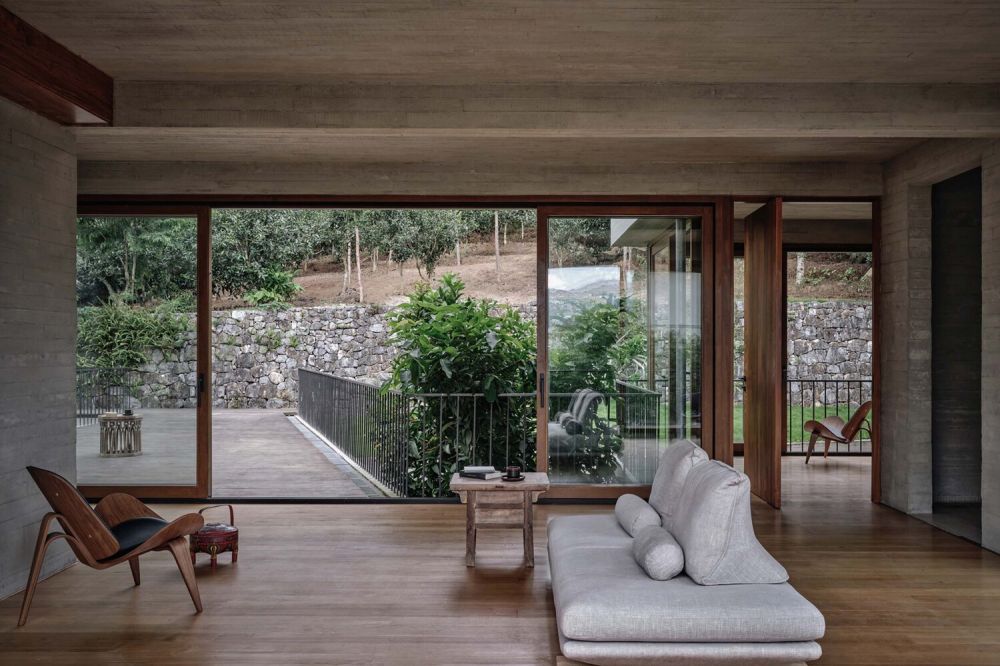 zhaoyang architects blends modern-industrial accents and nature into a ...