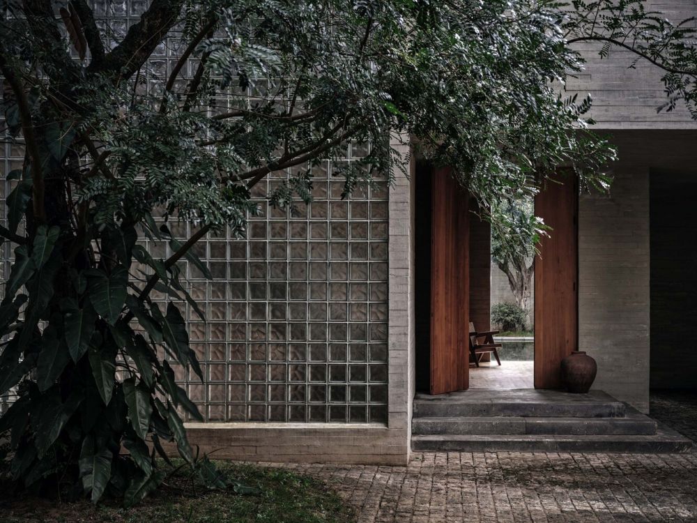zhaoyang architects blends modern-industrial accents and nature into a ...