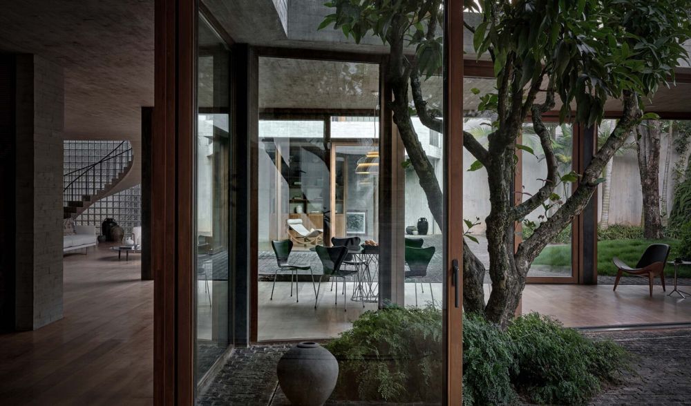 zhaoyang architects blends modern-industrial accents and nature into a ...