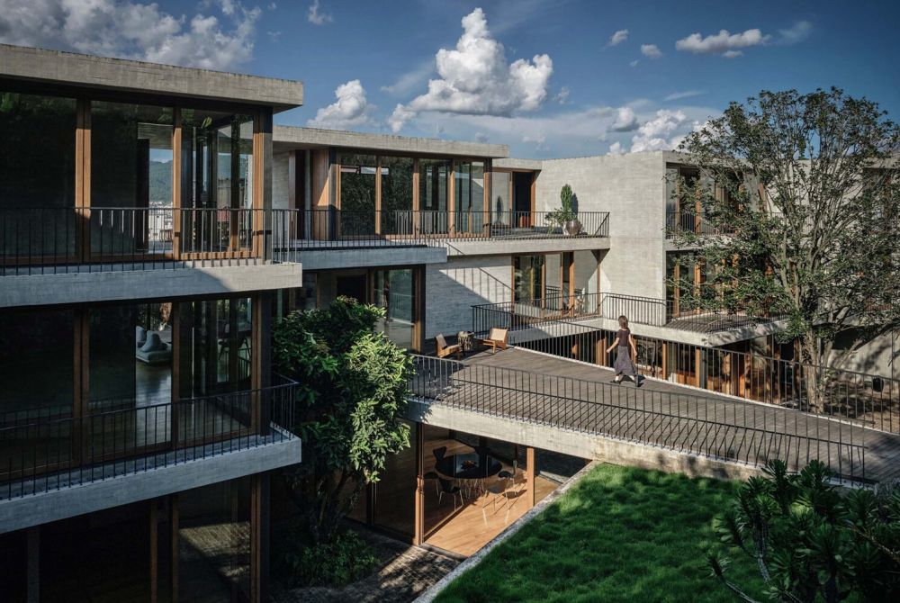 zhaoyang architects blends modern-industrial accents and nature into a ...