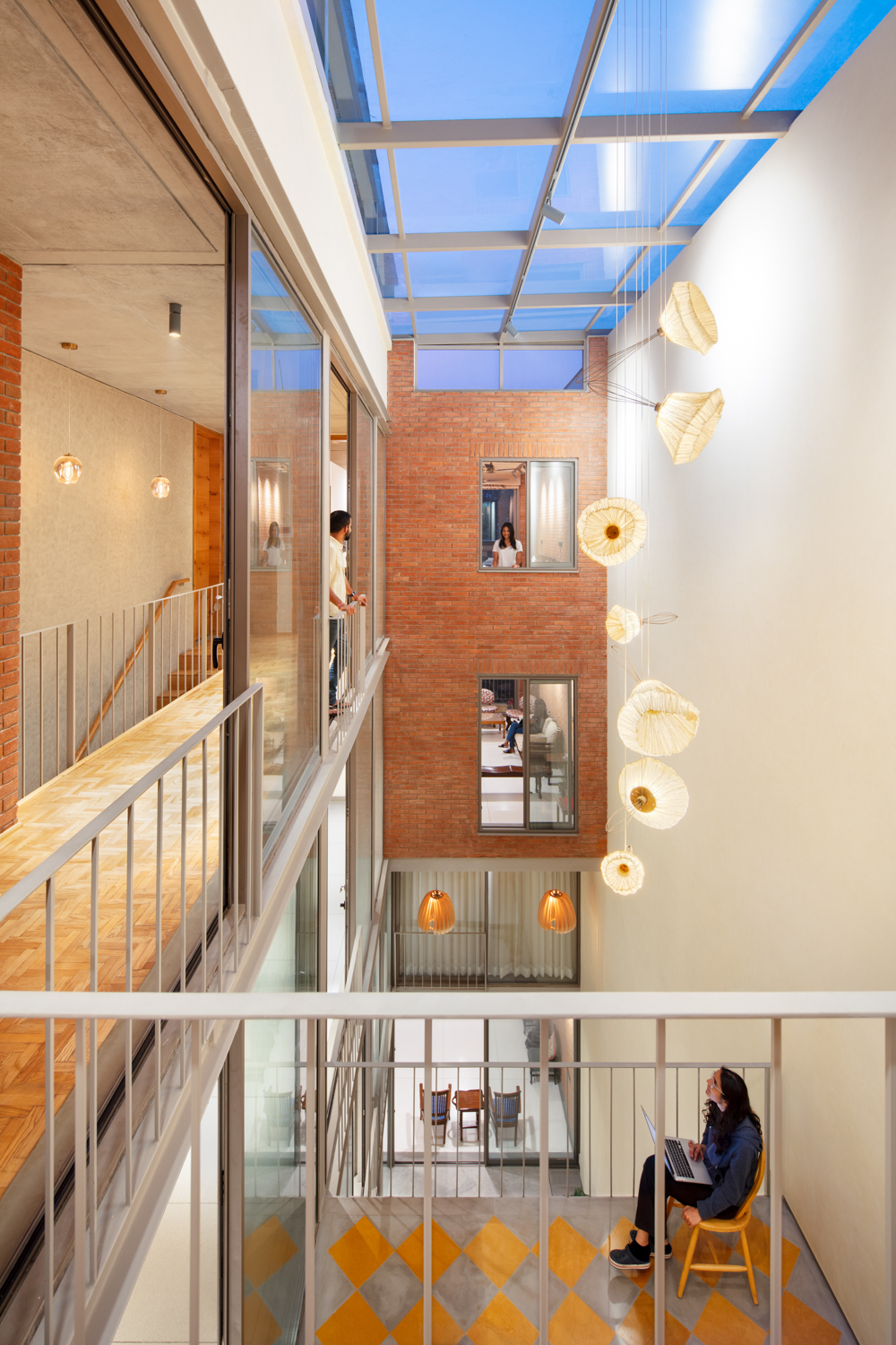 reimagining the archetype of poorly-lit row-houses: stacked house ...