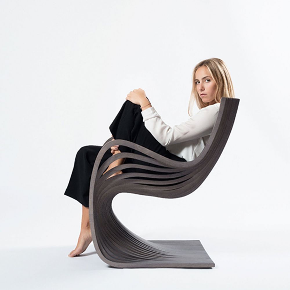 news: 8 sculptural chairs entirely made of wood | the design story