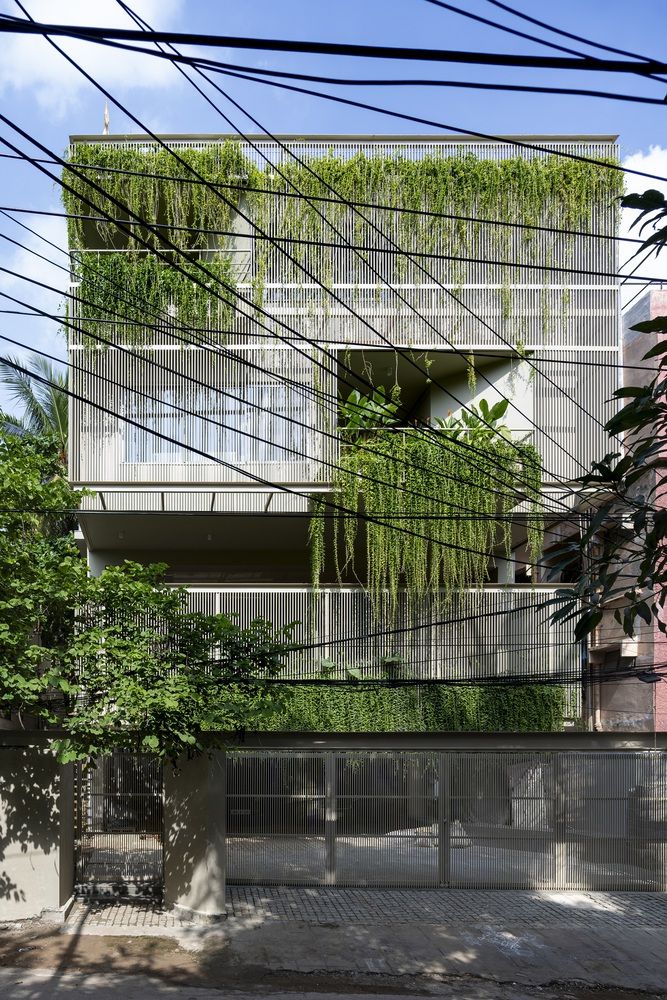 spacefiction studio completes a contemporary organic home with abundant ...