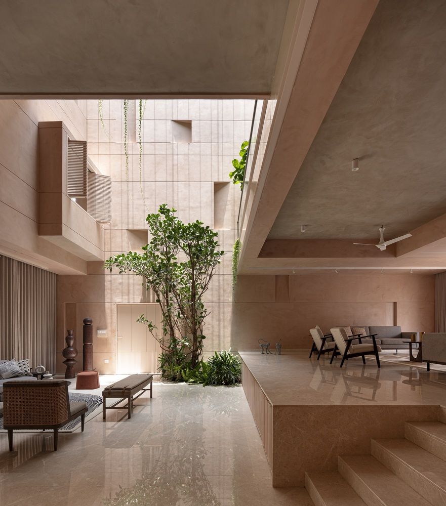 spacefiction studio completes a contemporary organic home with abundant ...