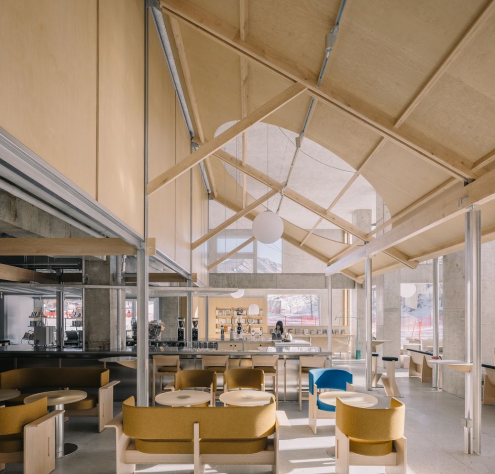 naïve bookstore utilizes warm and honest materials to frame literary ...