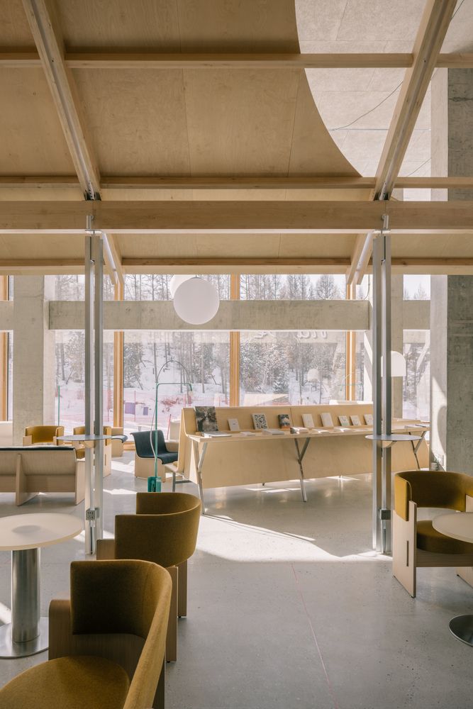 naïve bookstore utilizes warm and honest materials to frame literary ...