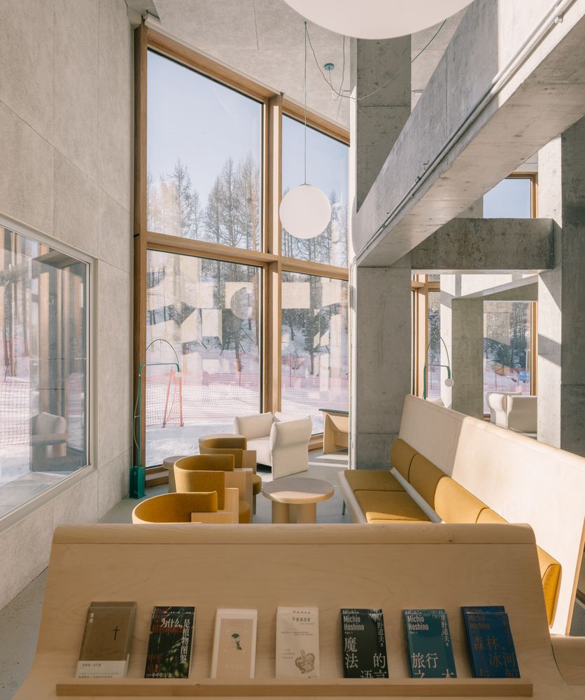 naïve bookstore utilizes warm and honest materials to frame literary ...