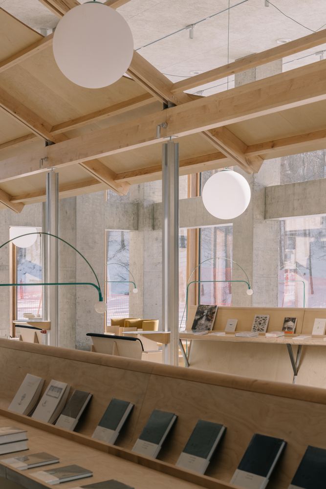 naïve bookstore utilizes warm and honest materials to frame literary ...