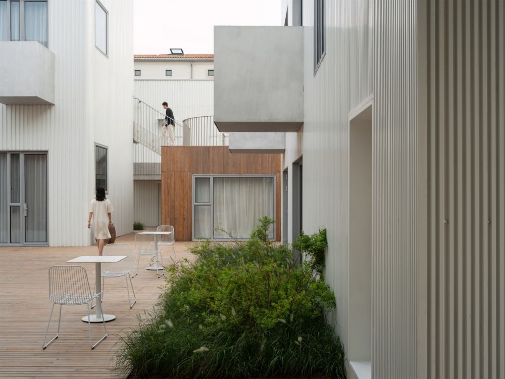 news: b.l.u.e architecture unveils ingenious hexagon design for tang ...