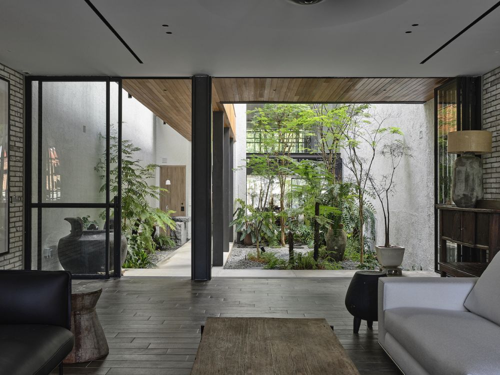 oku house is a layered sanctuary shaped by air, light, and privacy ...